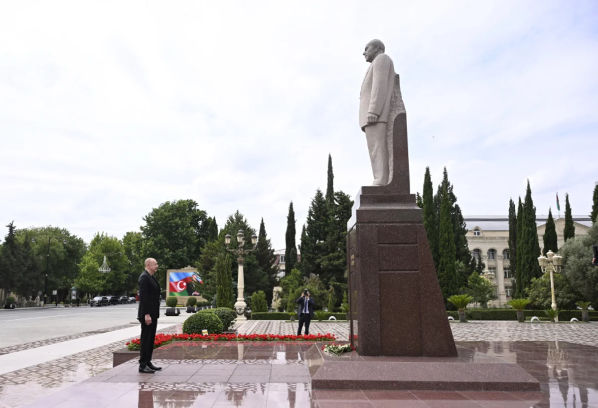 President Ilham Aliyev visits monument to national leader Heydar Aliyev ...